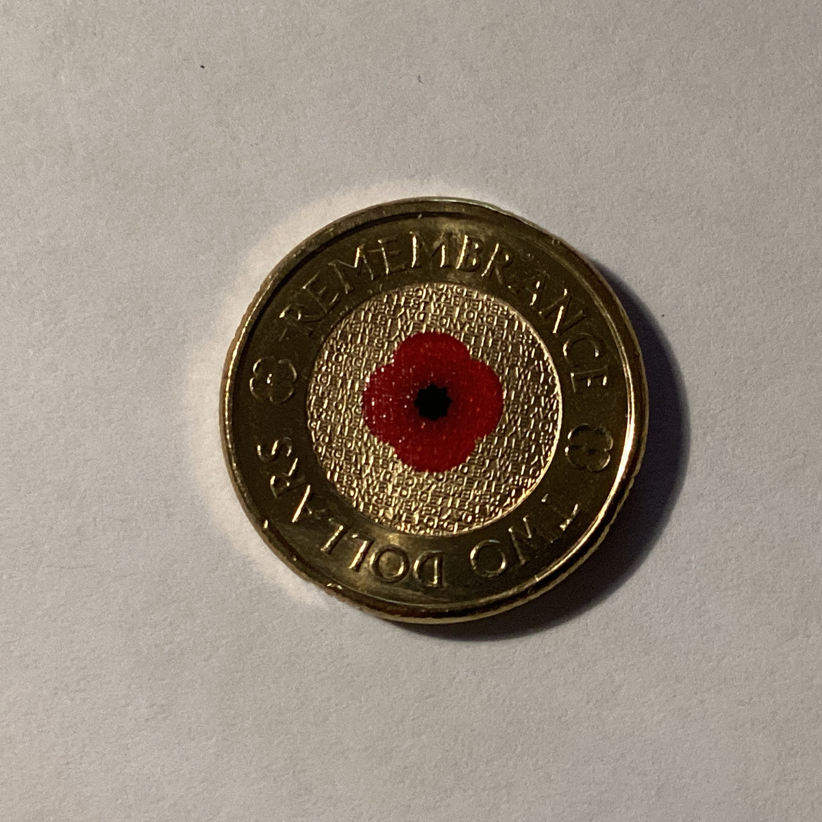 2012 $2 Red Poppy. Uncirculated Coin. – Ensleigh Coins