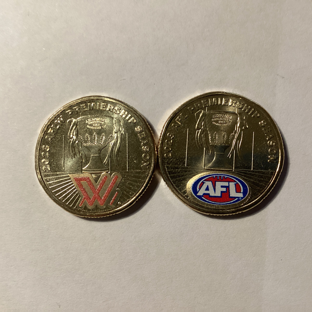 2023 $1 Uncirculated Coins. Coloured AFL & AFLW Coins. – Ensleigh Coins
