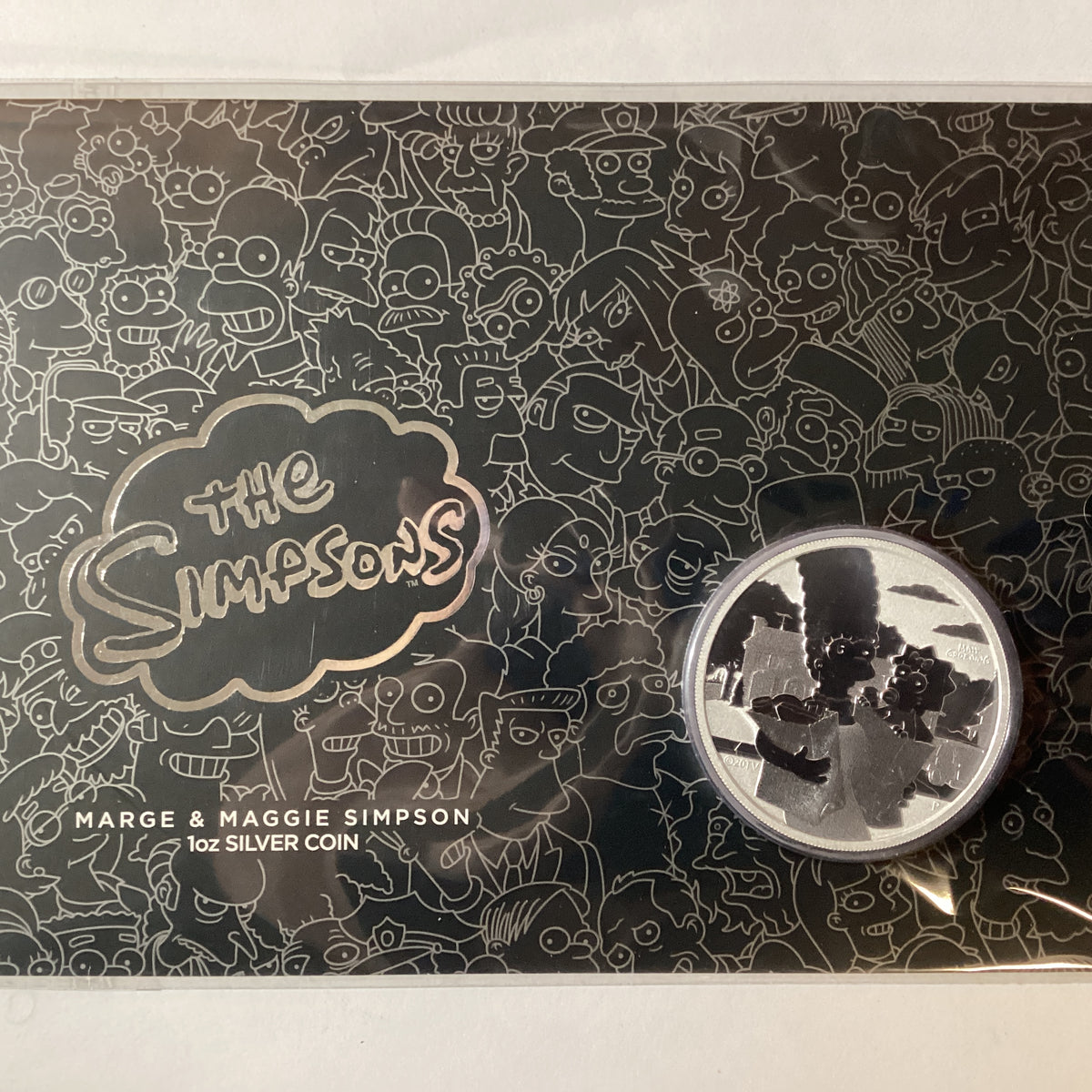 2021 $1 1oz Silver Carded Coin. The Simpsons. Marge and Maggie Simpson ...
