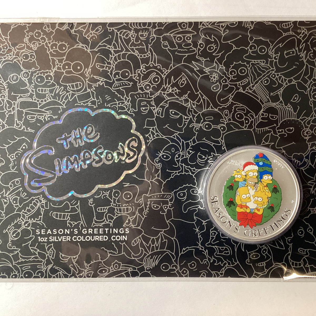 2022 $1 1oz Silver. Coloured Carded Coin. The Simpsons. Season’s Greet ...