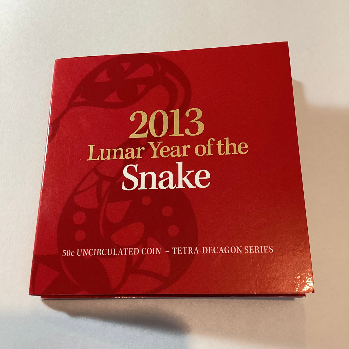 2013 50c Year of the Snake Tetra-Decagon Carded Coin – Ensleigh Coins